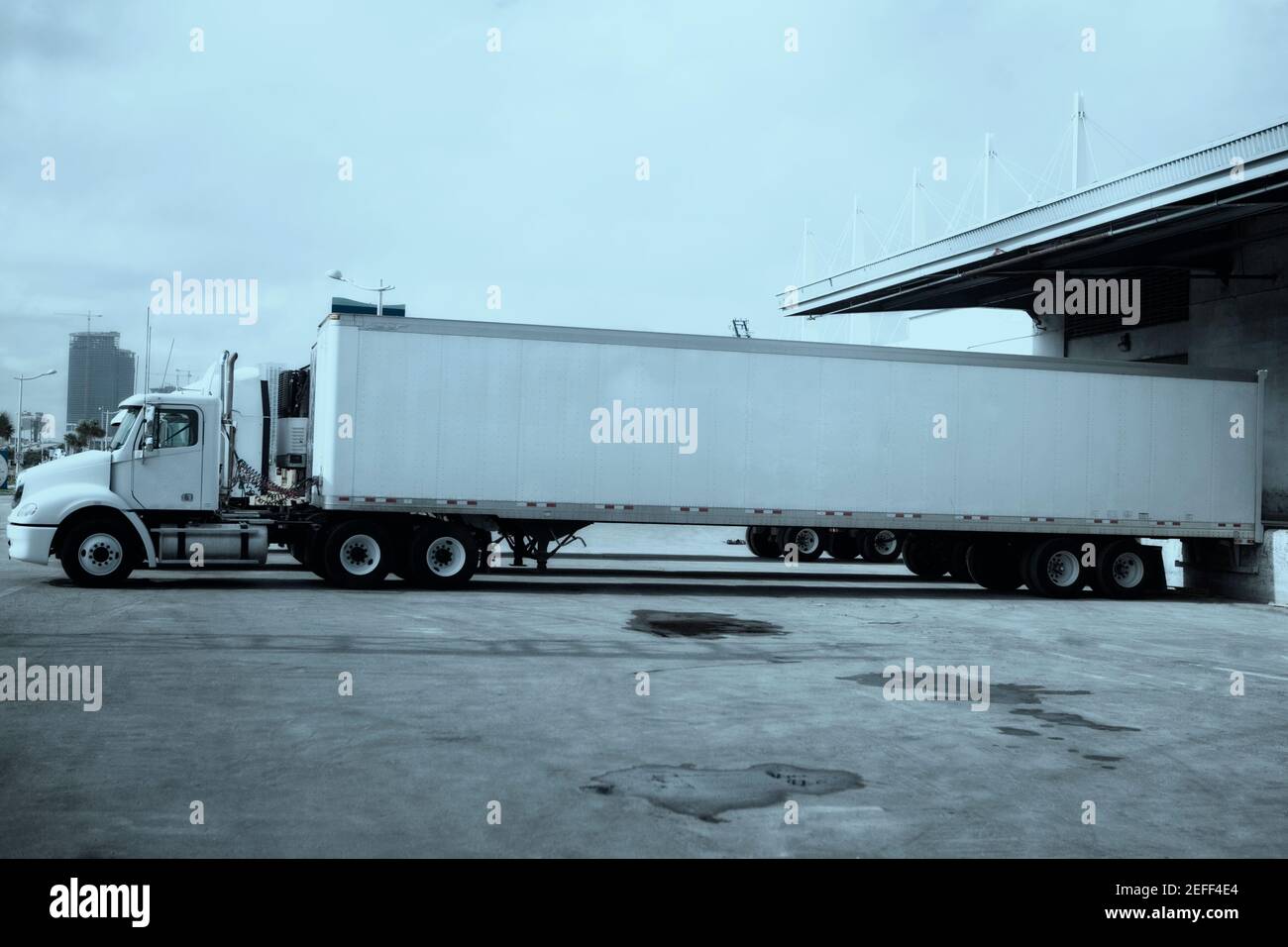 Semi-truck at a shipping port Stock Photo - Alamy