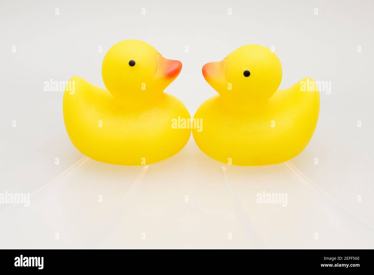 Two yellow rubber toy ducks hi-res stock photography and images - Alamy