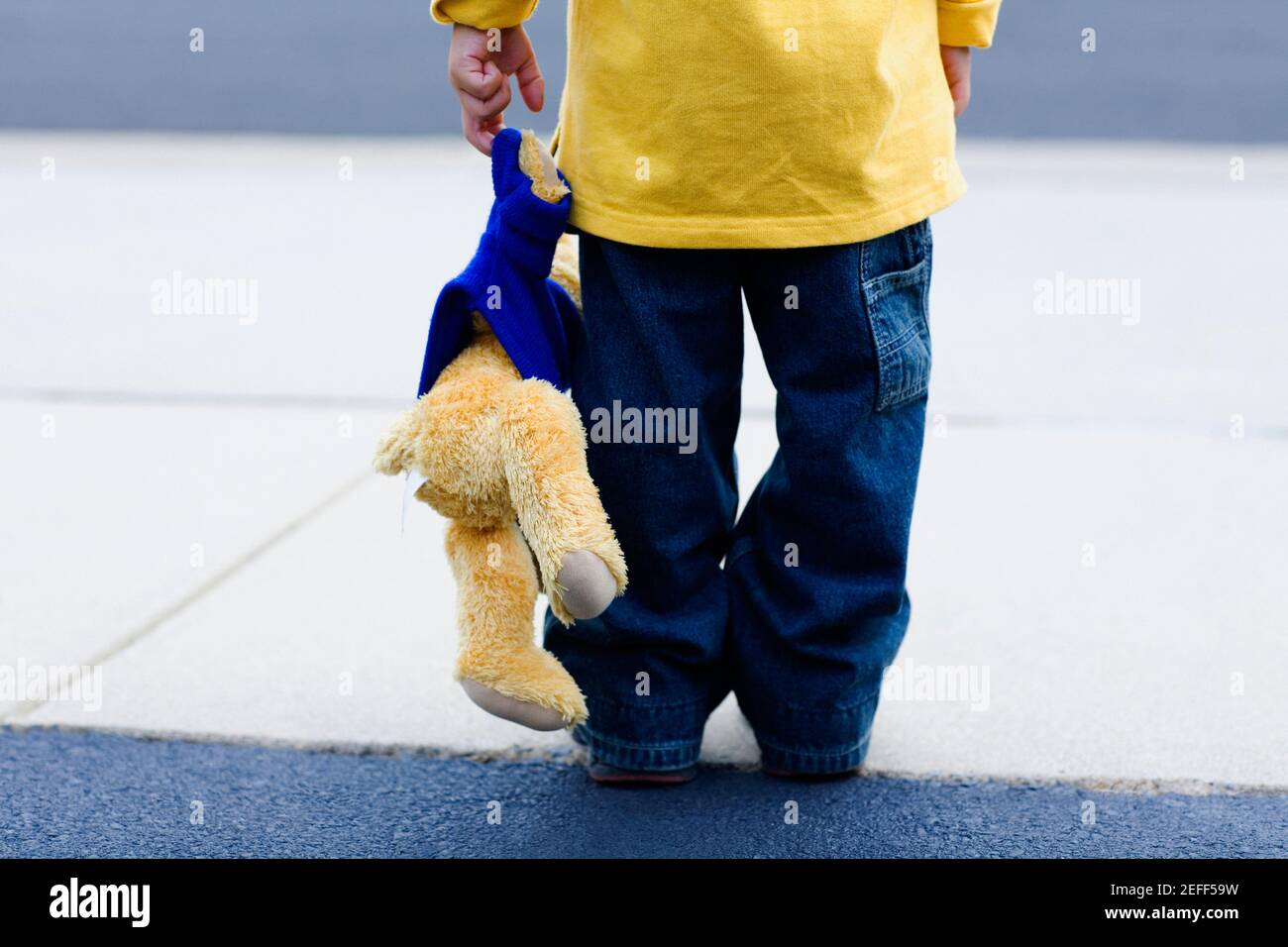 Rear view child teddy hi-res stock photography and images - Alamy