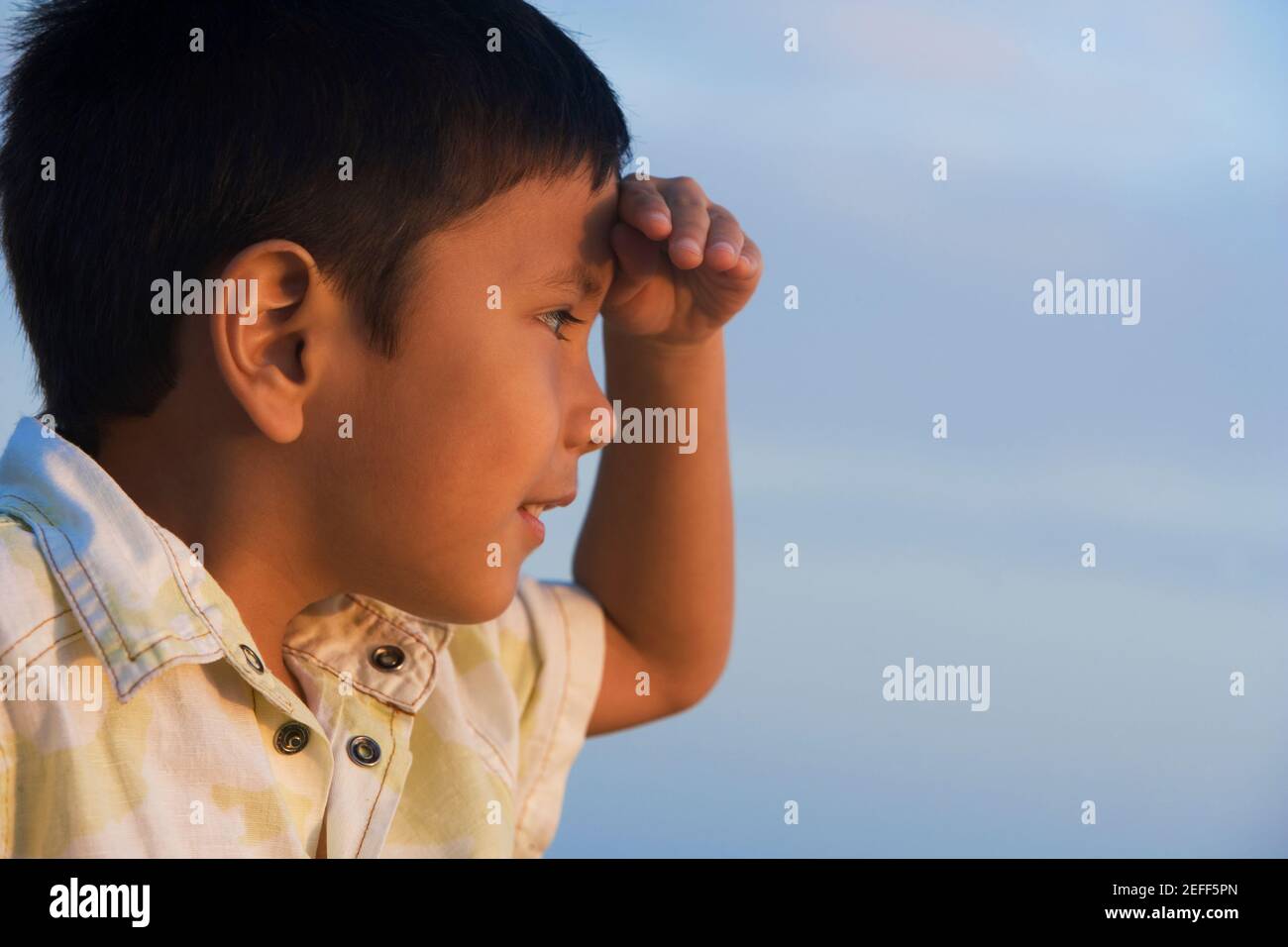 Child shielding eyes hi-res stock photography and images - Alamy