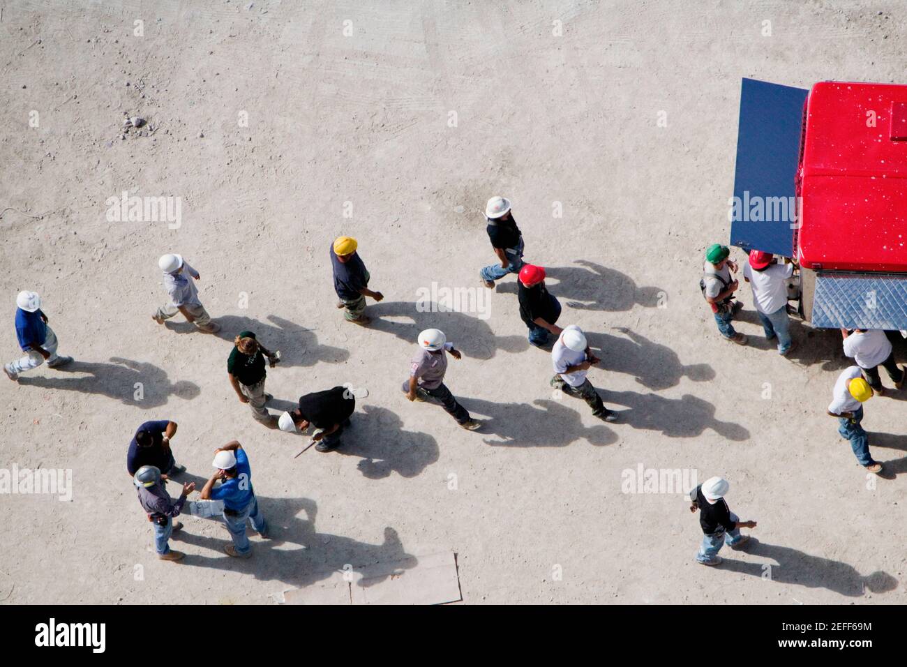 High angle view of construction workers near a semi truck Stock Photo ...