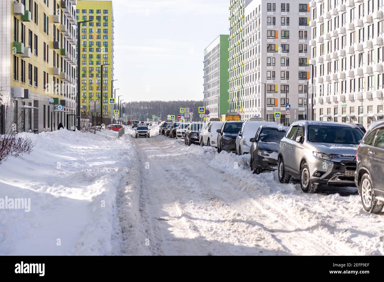 Moscow. Russia. Snowfall in February. Driveways in yards after a ...