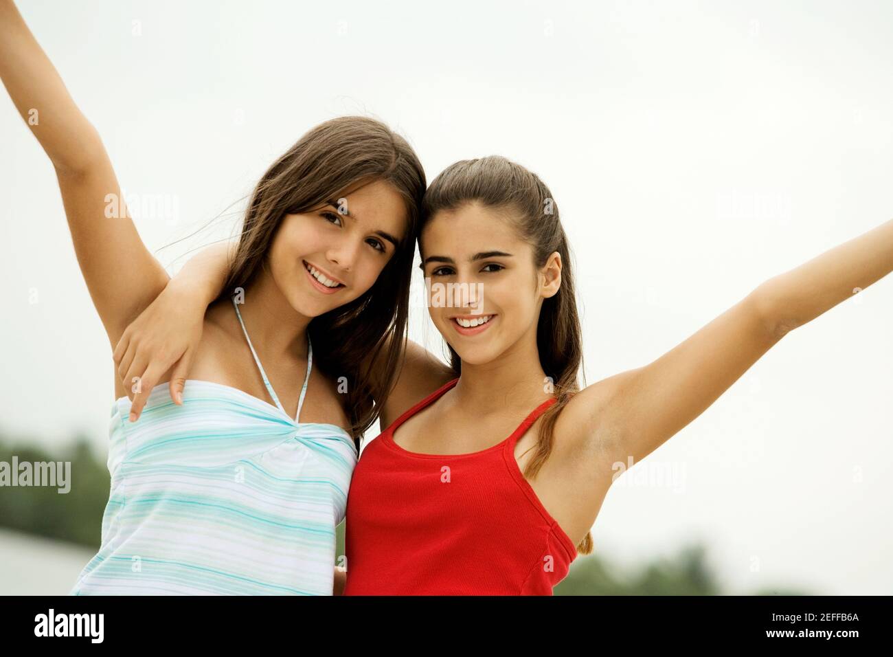 Teenage Girls Arm Around Other High Resolution Stock Photography and ...