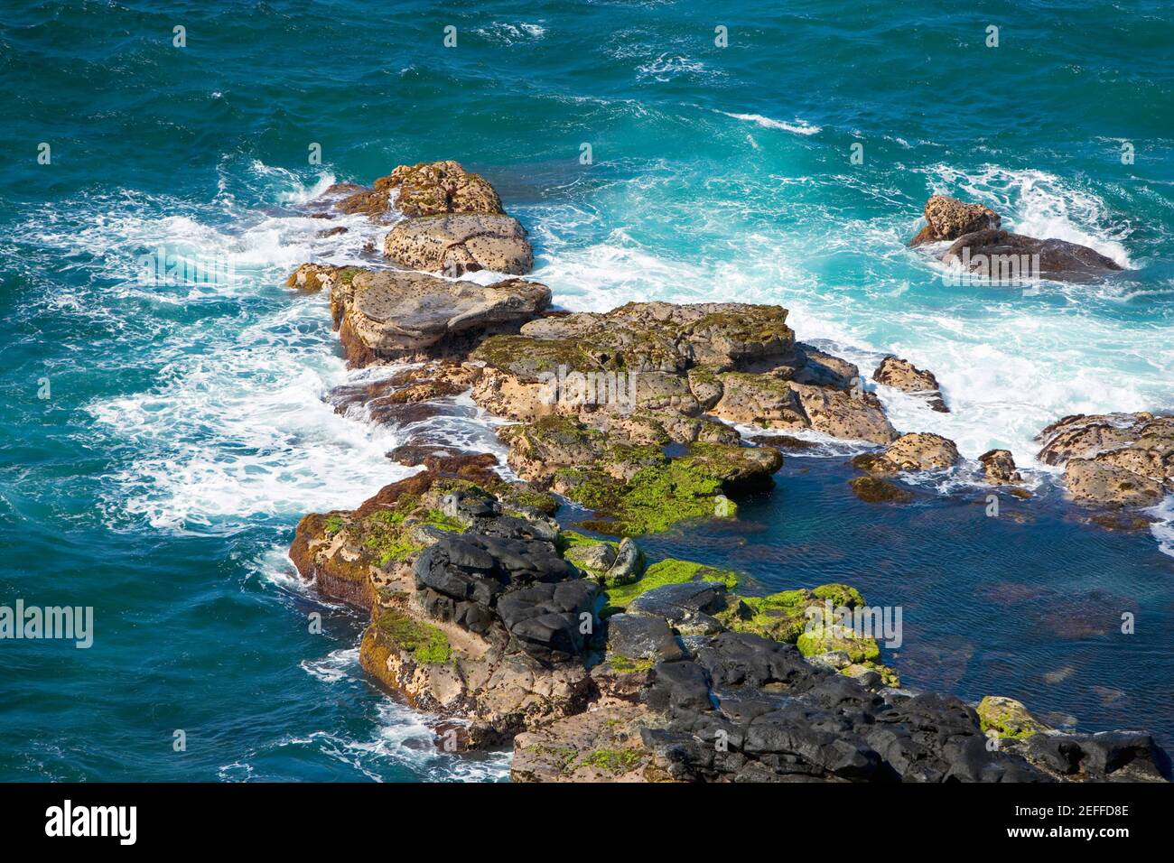 Rock formations in the sea, Hookipa Beach, Maui, Hawaii Islands, USA ...