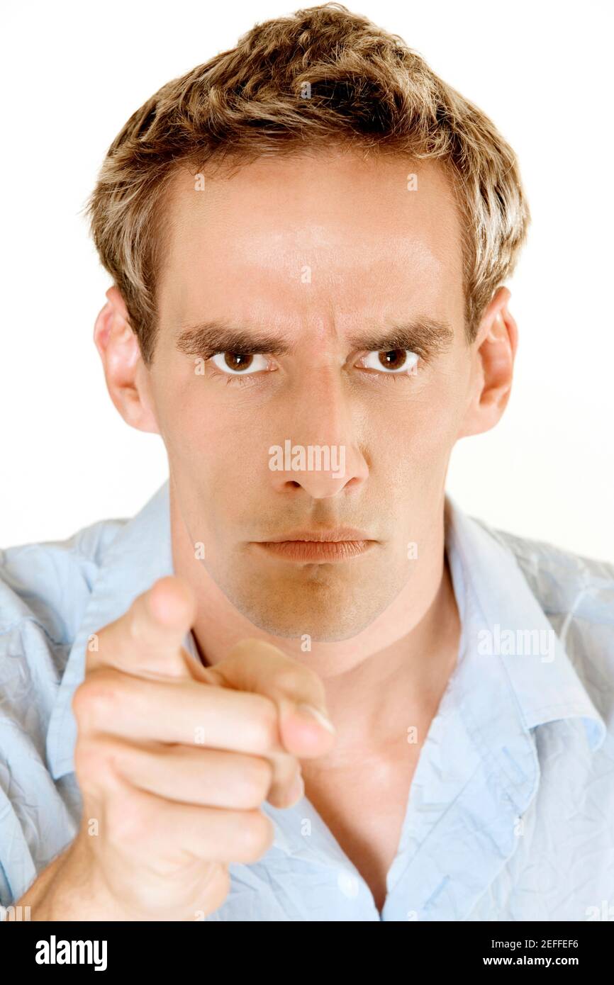 Portrait of a young man pointing forward Stock Photo - Alamy Portrait of a young man pointing forward Stock Photo - Alamy