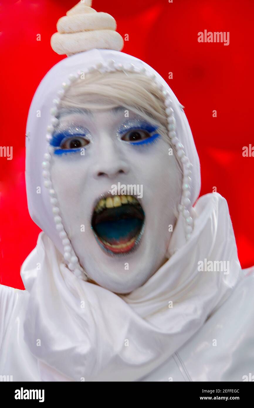 Portrait of a girl with a painted face shouting Stock Photo - Alamy