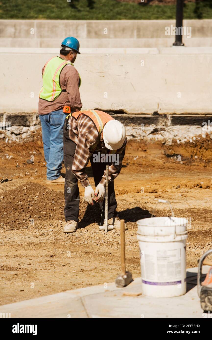 Two construction workers focus hi-res stock photography and images - Alamy