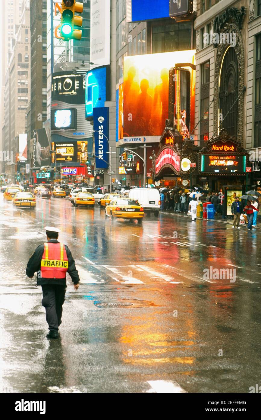 Traffic cop rain hi-res stock photography and images - Alamy