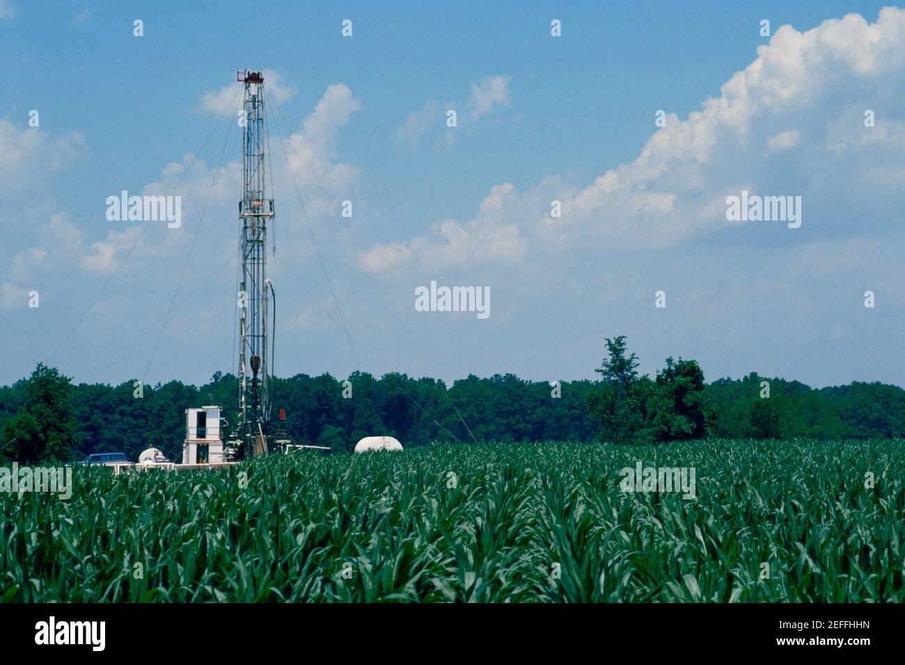 Oil rig in agricultural field Stock Photo - Alamy