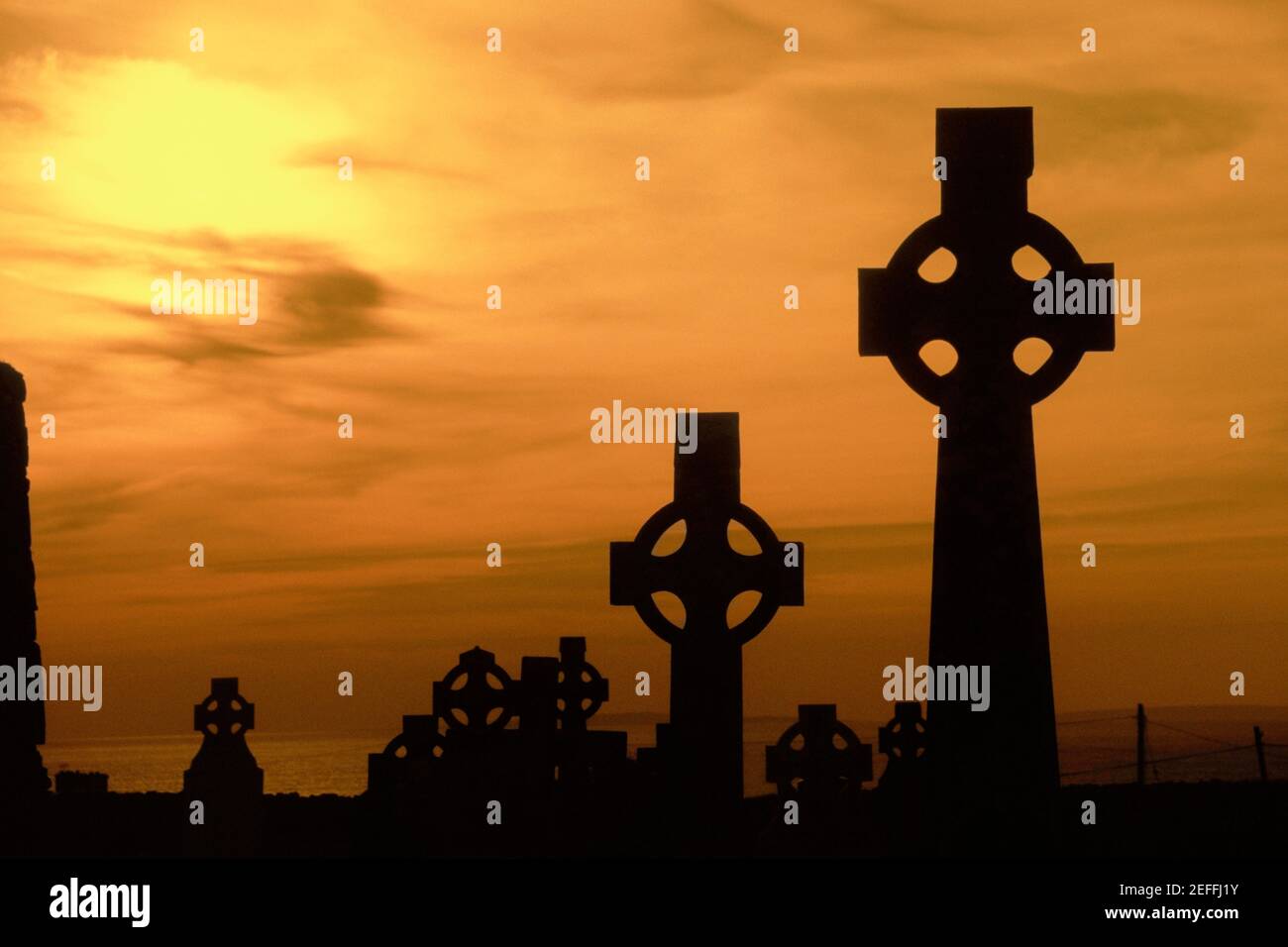 Celtic crosses at dusk, County Clare, Republic of Ireland Stock Photo ...