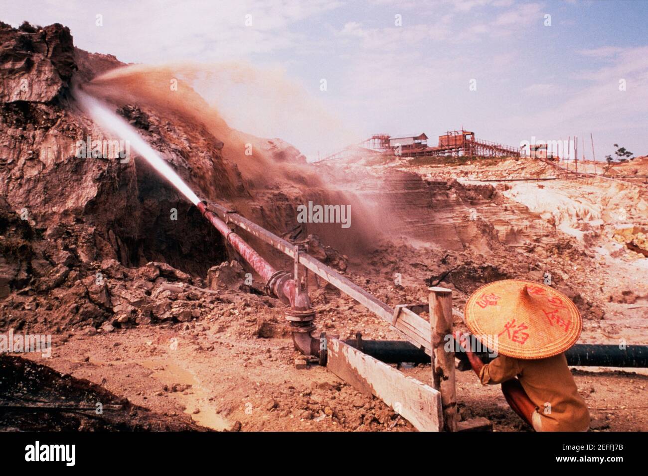 Mining operation in Asia Stock Photo - Alamy