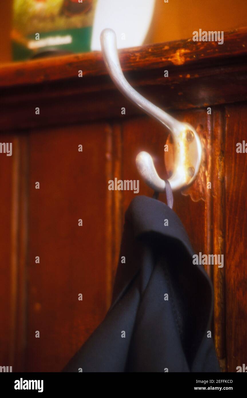 Hanging up coat hi-res stock photography and images - Alamy