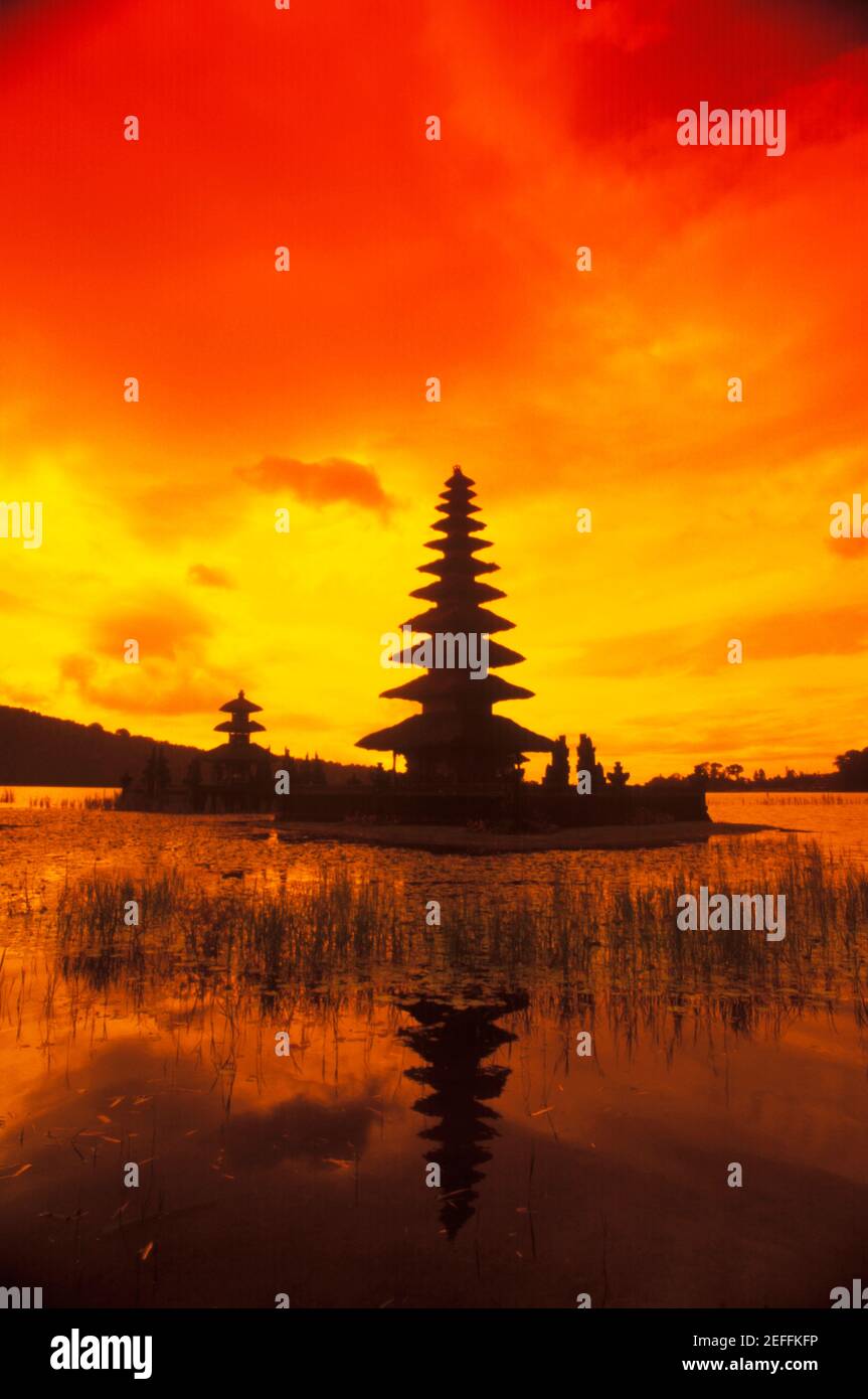 Reflection of a temple in water, Pura Ulu Danau Temple, Bali, Indonesia ...