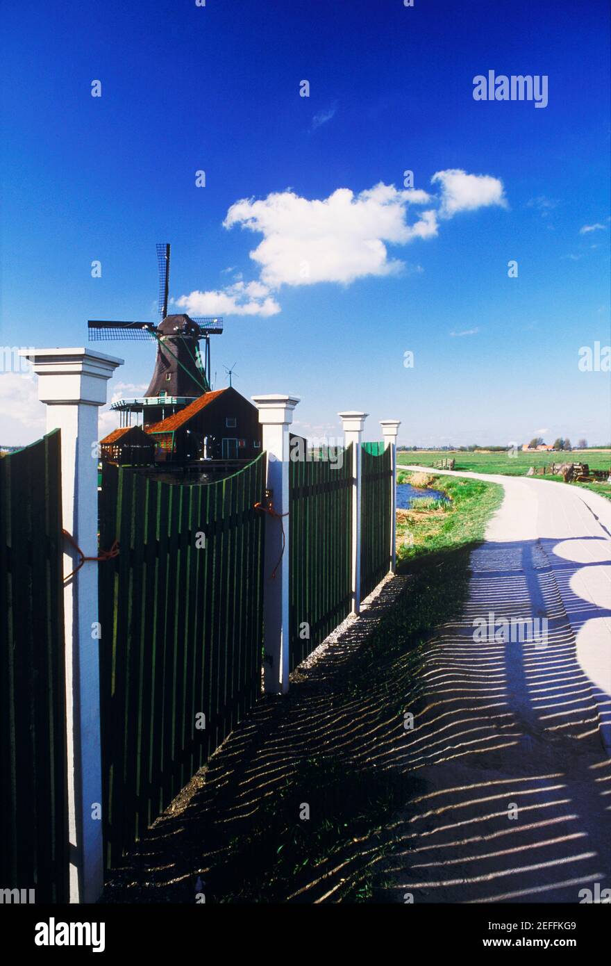 Traditional windmill in a village, Amsterdam, Netherlands Stock Photo ...