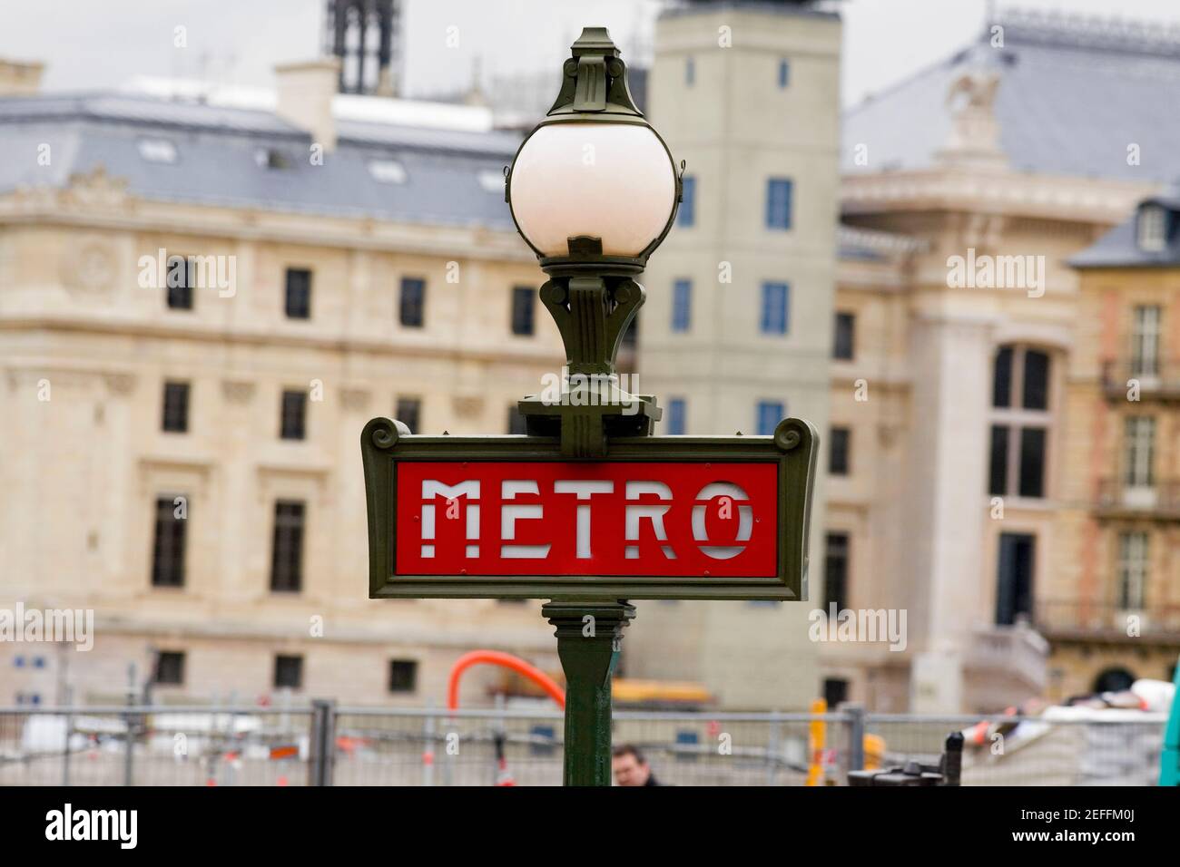 Signboard on a lamppost with buildings in the background, Paris, France ...