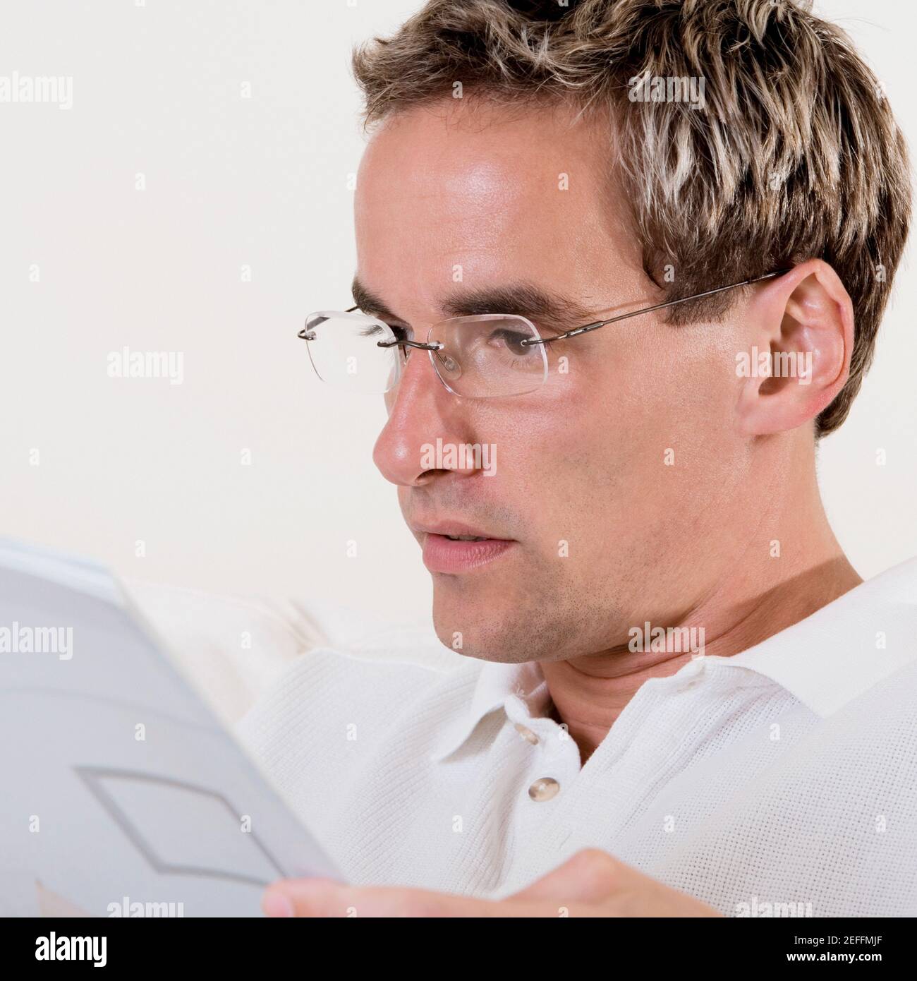 Book reading eyeglasses concentrate hi-res stock photography and images ...