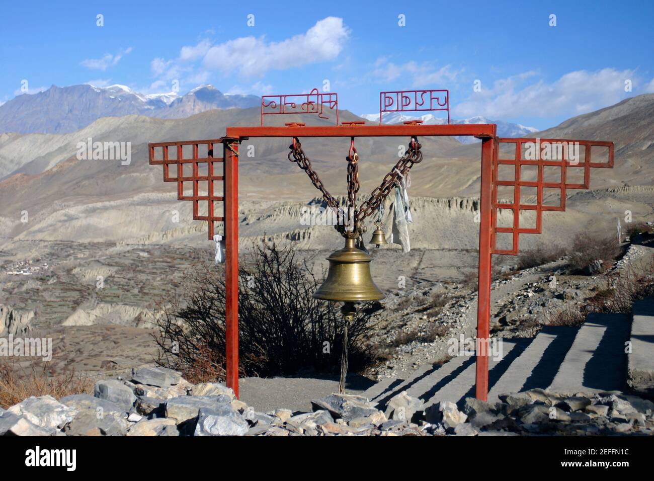 Close-up of a bell hanging from a metallic structure, Muktinath ...