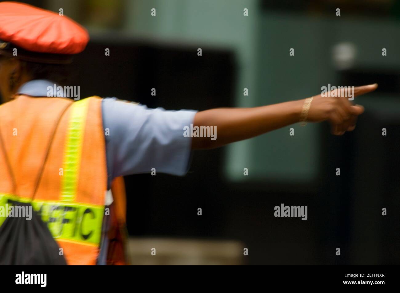 Rear view of a traffic cop directing traffic, Chicago, Illinois, USA ...