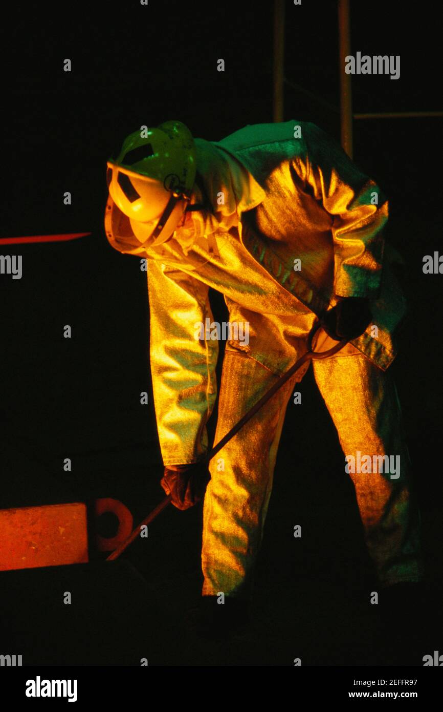 Male worker working in a steel mill, Kawasaki, Kanagawa Prefecture ...