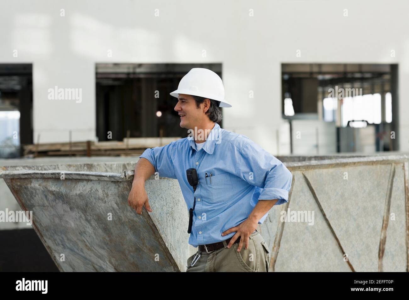 Man hanging on side of building hi-res stock photography and images - Alamy