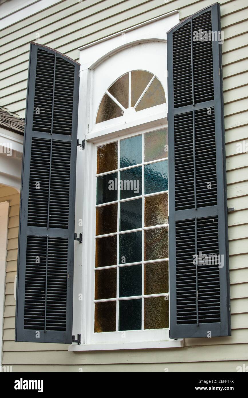 Large exterior view of a window with a curved semi circle top portion ...