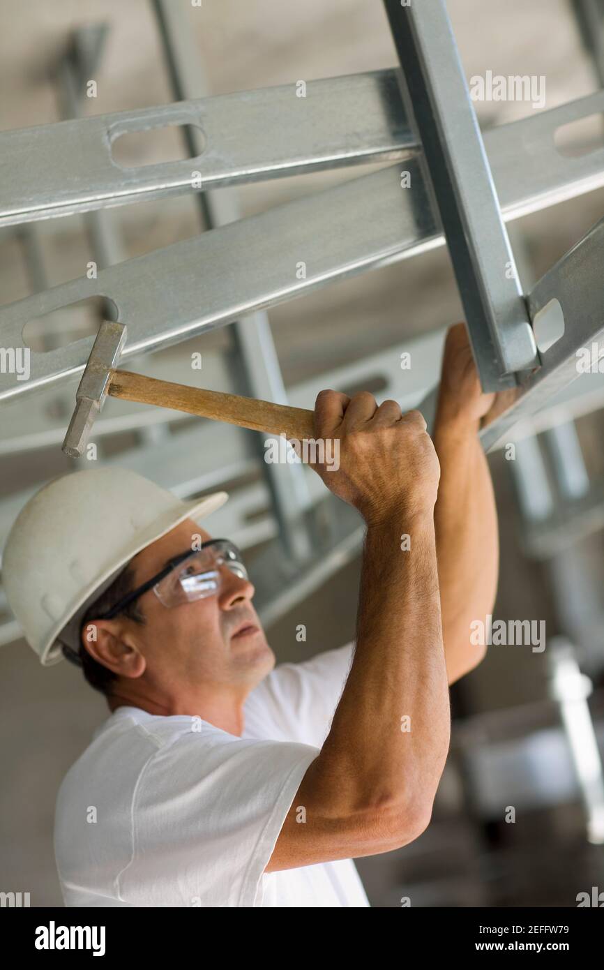 Hitting with a hammer hi-res stock photography and images - Alamy