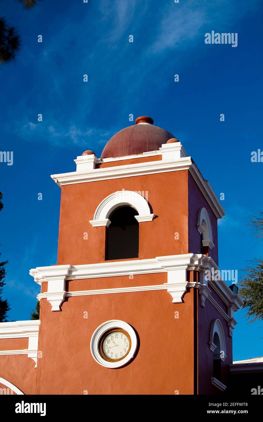 Low angle view of a clock tower, Hotel Mossone, Huacachina, Ica, Ica ...