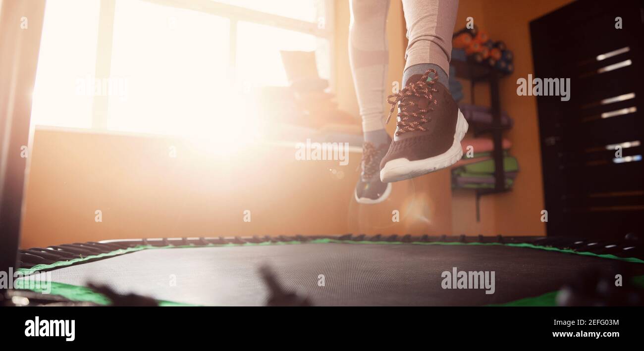 Smiling women jumping on mini hi-res stock photography and images - Alamy