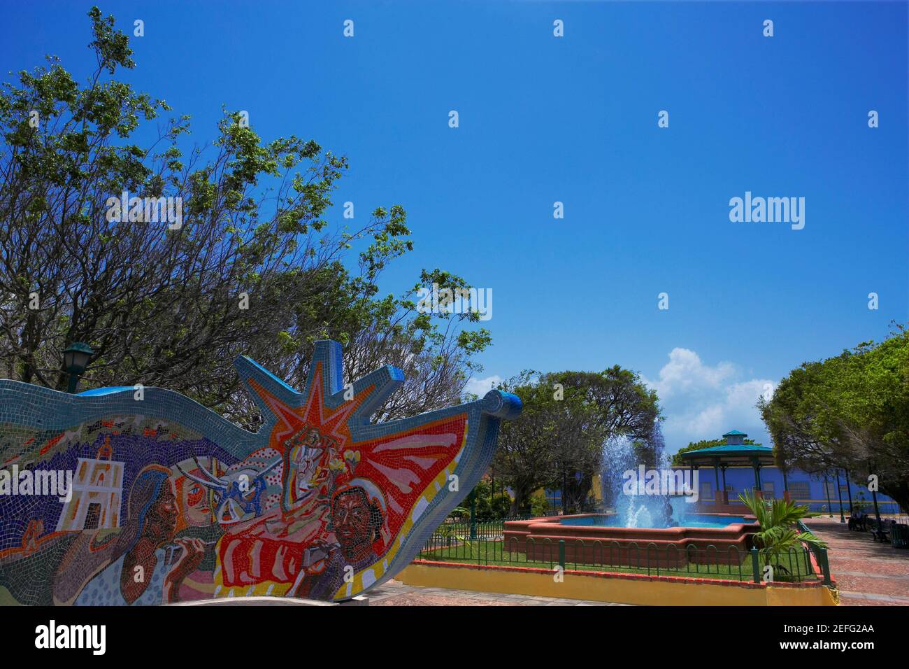 Fountain and a sculpture in a plaza, Loiza, Puerto Rico Stock Photo - Alamy