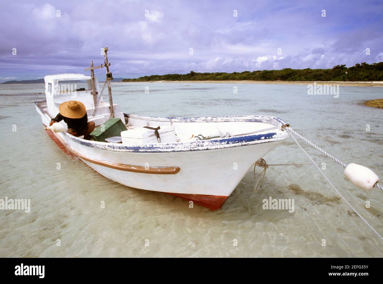 Seaweed Gatherer on a boat, Taketomi, Ryukyus, Japan Stock Photo - Alamy
