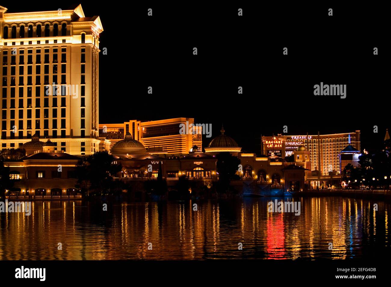 Buildings at the waterfront lit up at night, Las Vegas, Nevada, USA ...