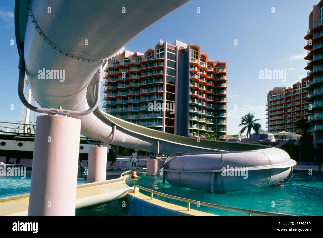 Playground slide man standing hi-res stock photography and images - Alamy