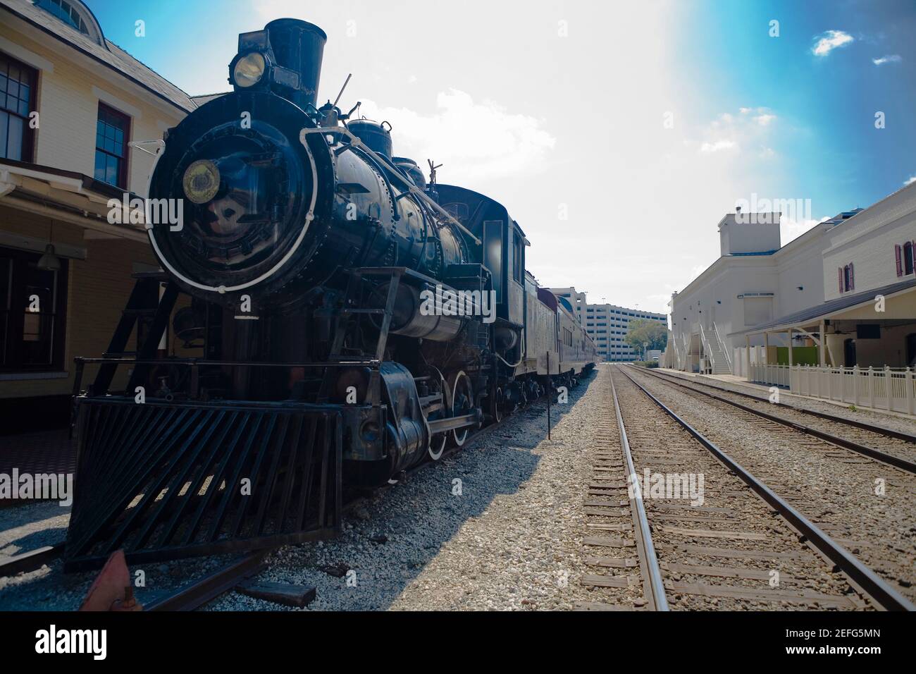 Train on a railroad track, Church Street Station, Orlando, Florida, USA ...