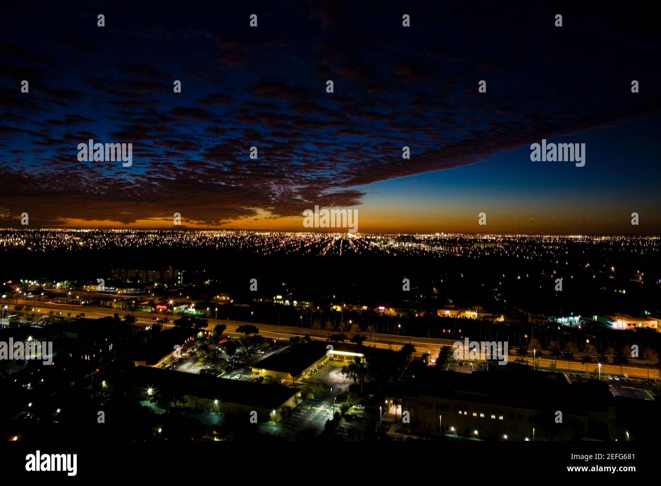 High angle view of a city lit up at night, Miami, Florida, USA Stock ...
