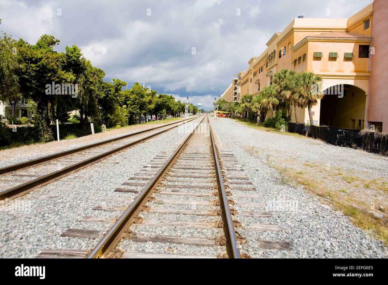 Building along a railroad track Stock Photo - Alamy