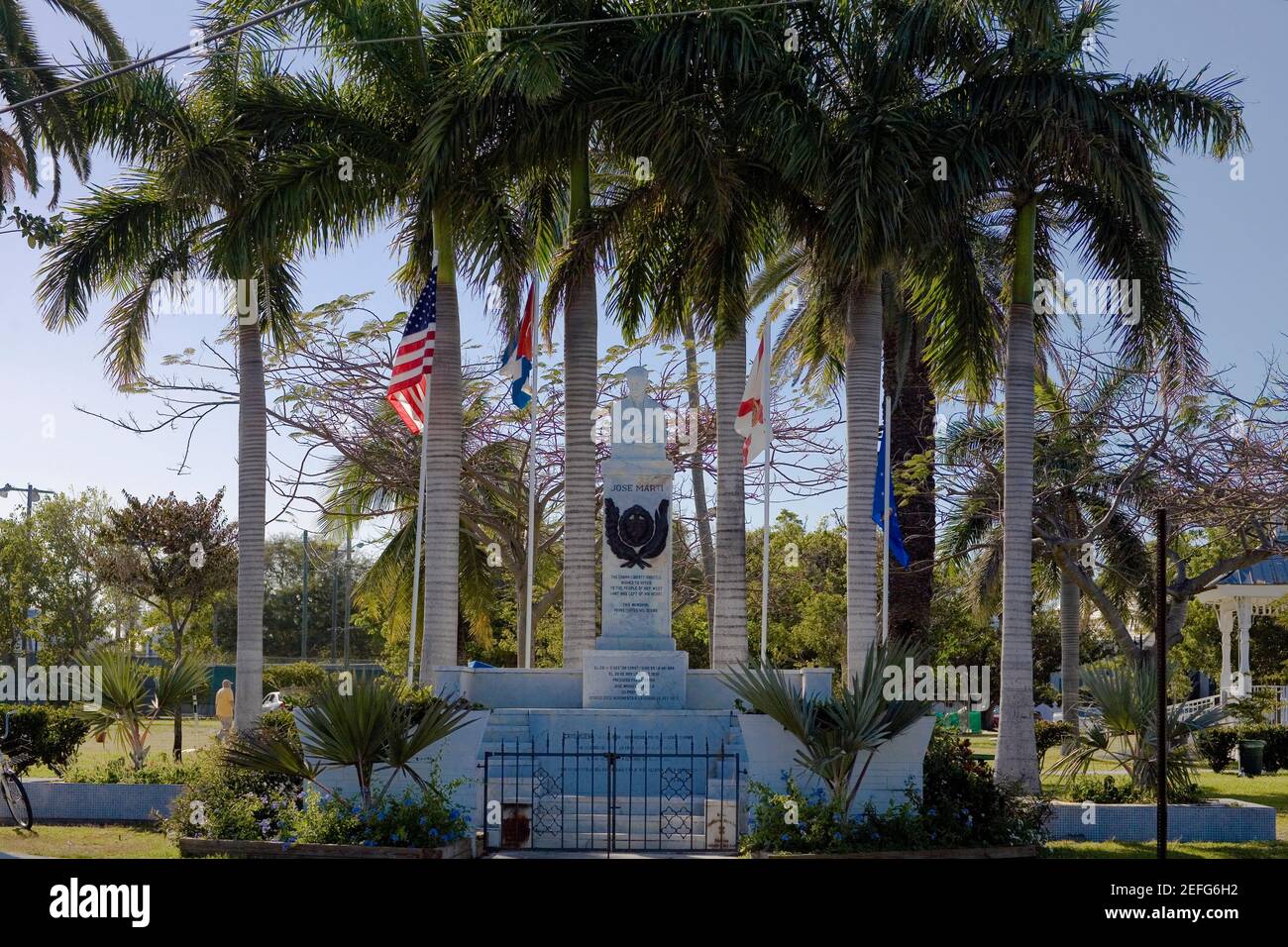 Statue surrounded by flags in a park, Bayview Park, Key West, Florida ...