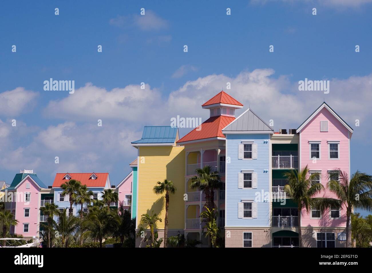 Palm trees in front of buildings, Paradise Island, Bahamas Stock Photo ...