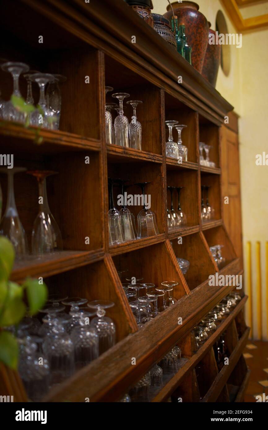 Stem glasses on a shelf Stock Photo - Alamy