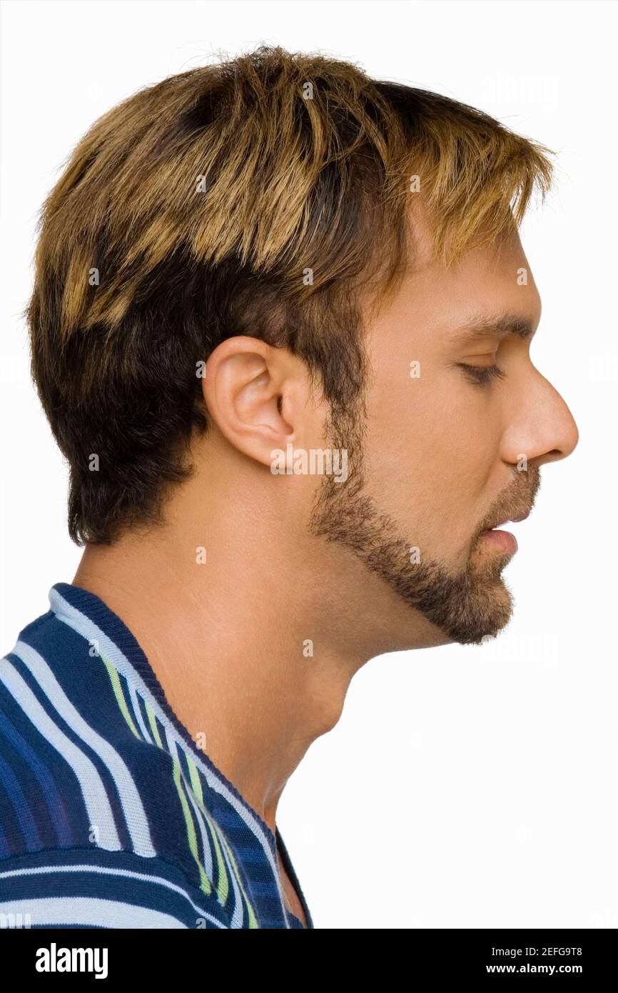 Side profile of a mid adult man thinking Stock Photo - Alamy
