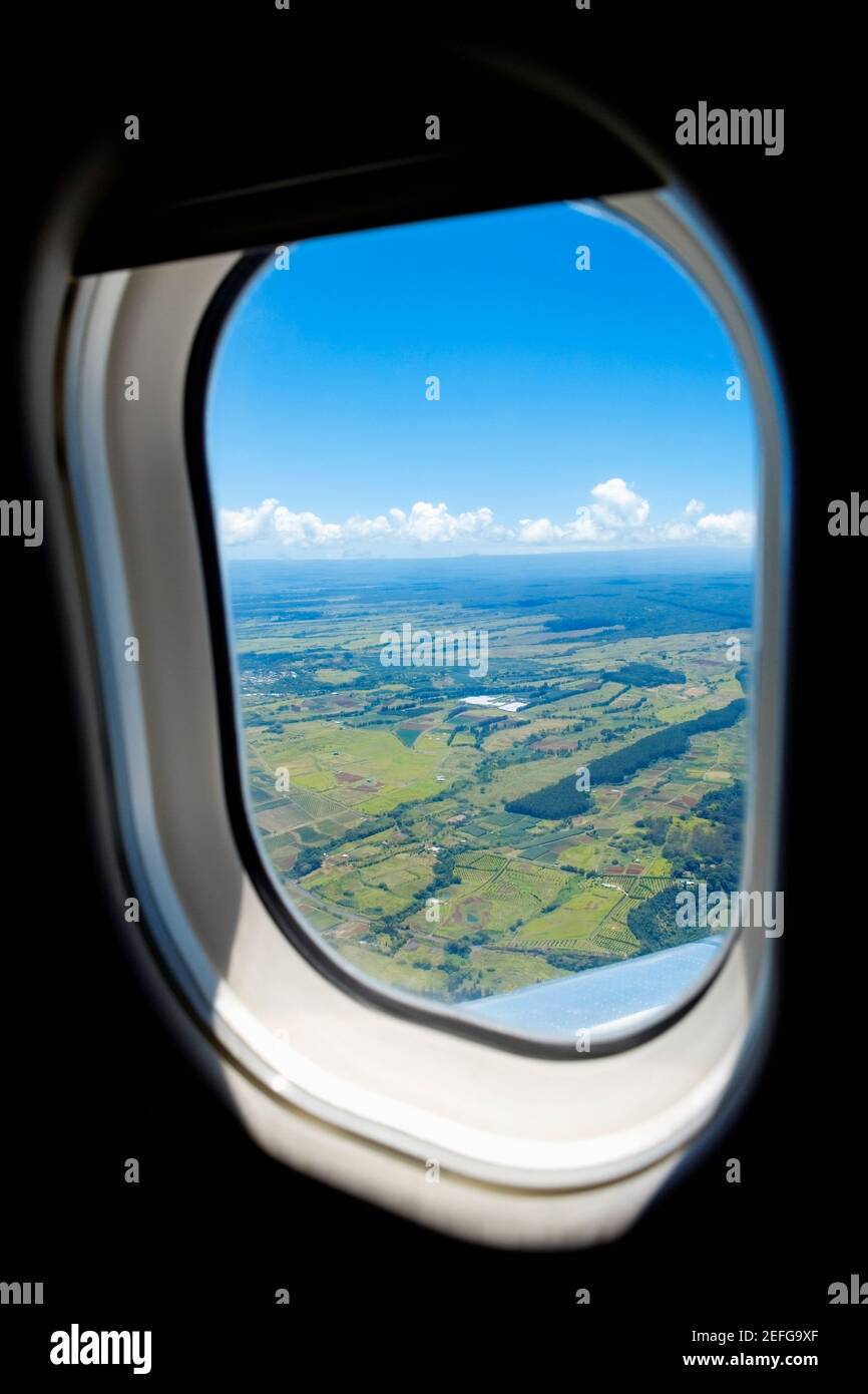 Aerial view of a landscape viewed through an airplane window Stock ...