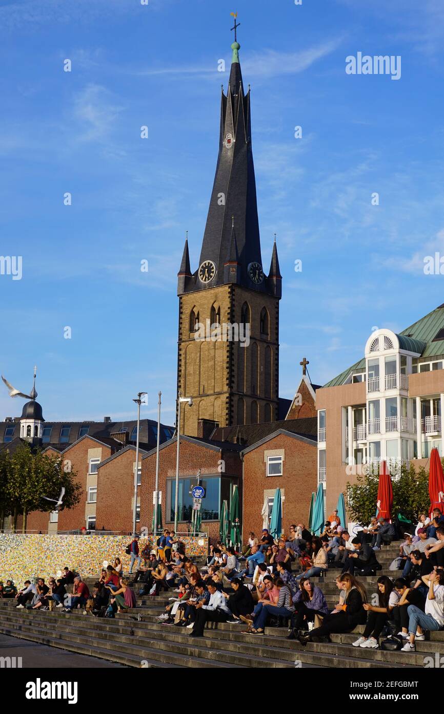 The stairs at the Rhine river promenade, a popular place for relaxation ...