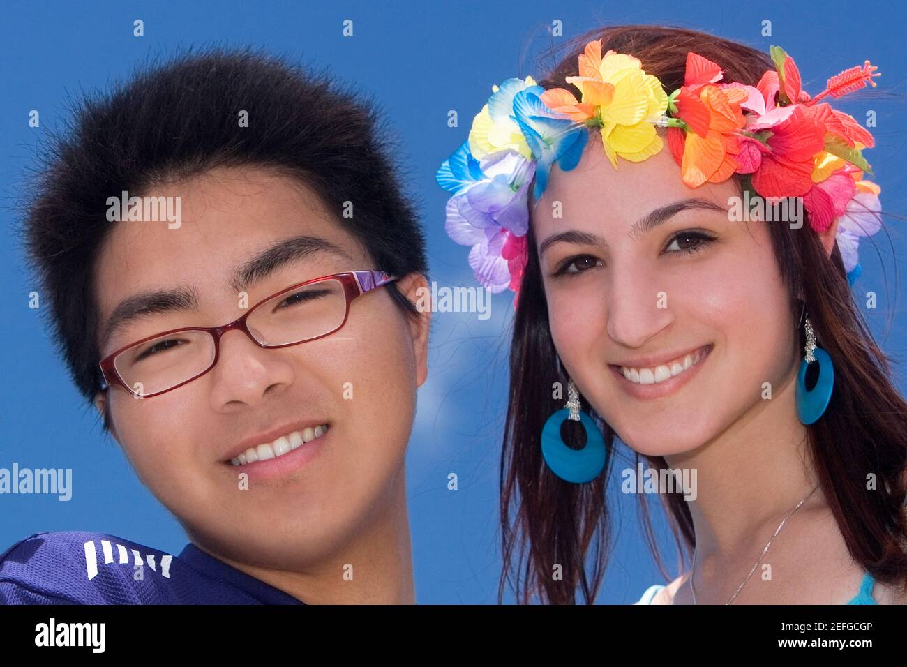 Portrait of a young man with his friend smiling Stock Photo - Alamy