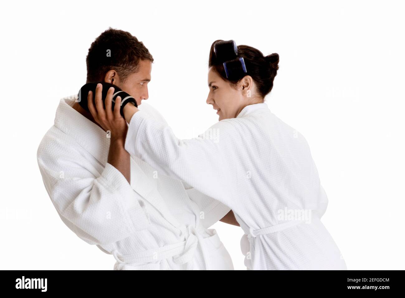 Side profile of a young couple sparring Stock Photo - Alamy