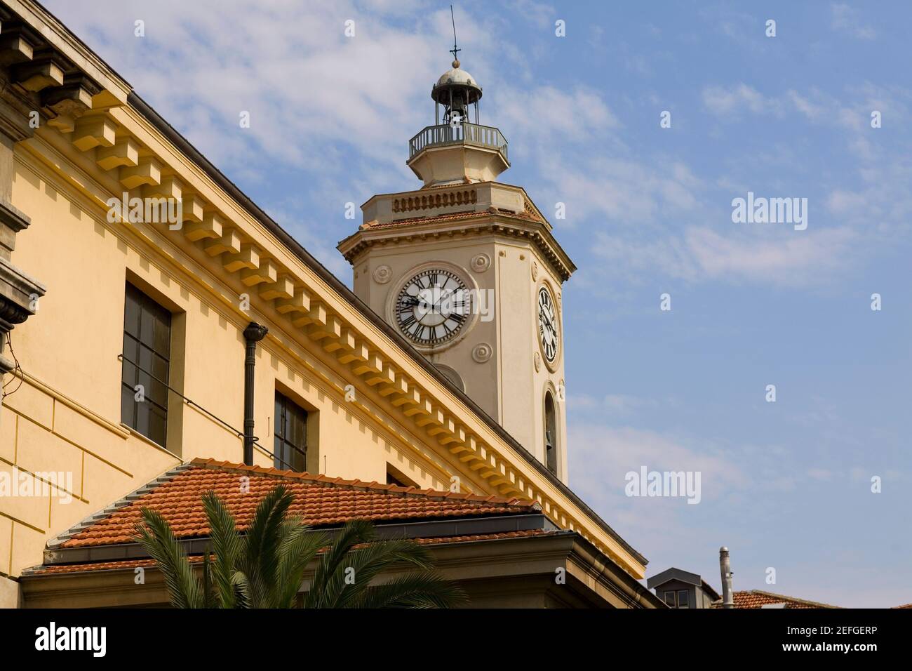 Low angle view of a clock tower of a building, Nice, France Stock Photo ...