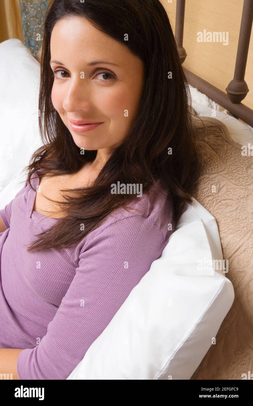 Female reclining pillow hi-res stock photography and images - Alamy
