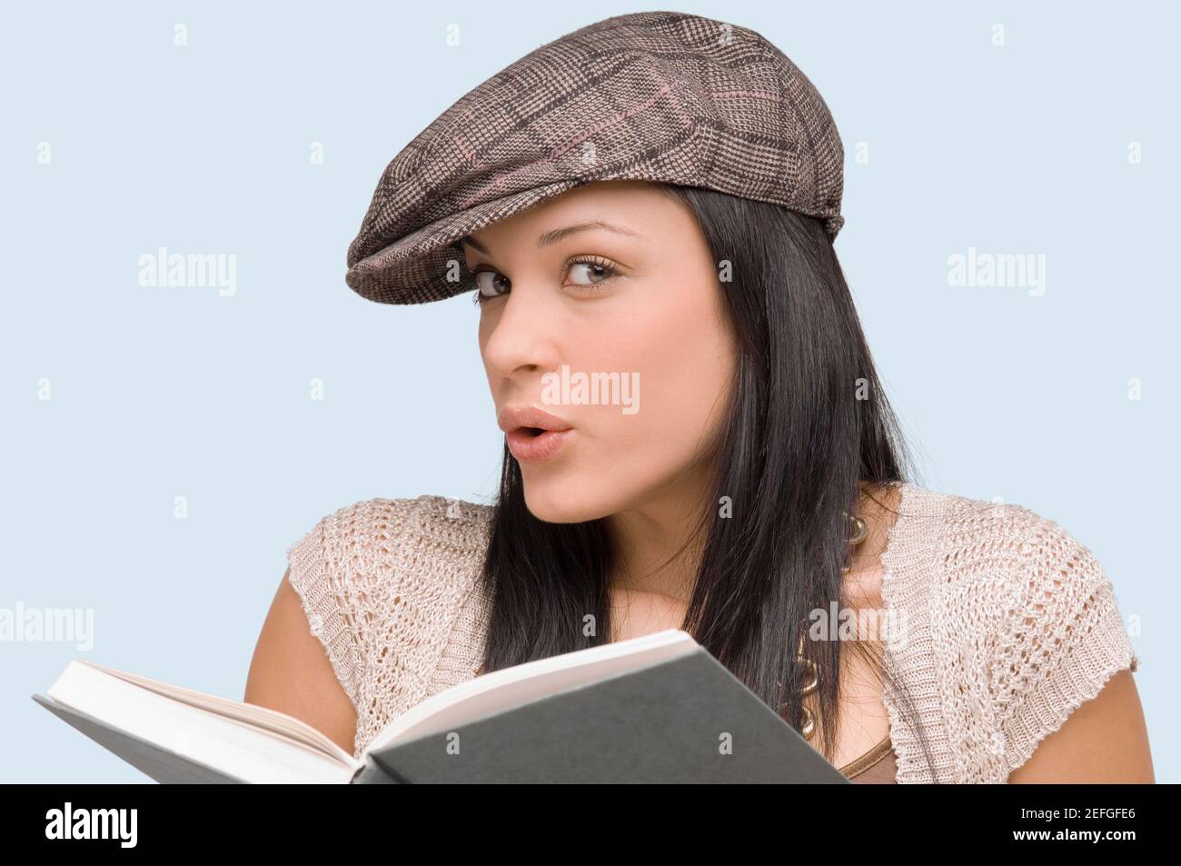 Young woman whistling portrait hi-res stock photography and images - Alamy