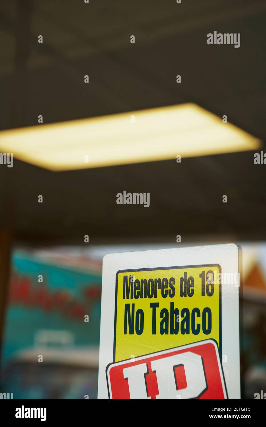 Close-up of a Warning sign in a store Stock Photo - Alamy
