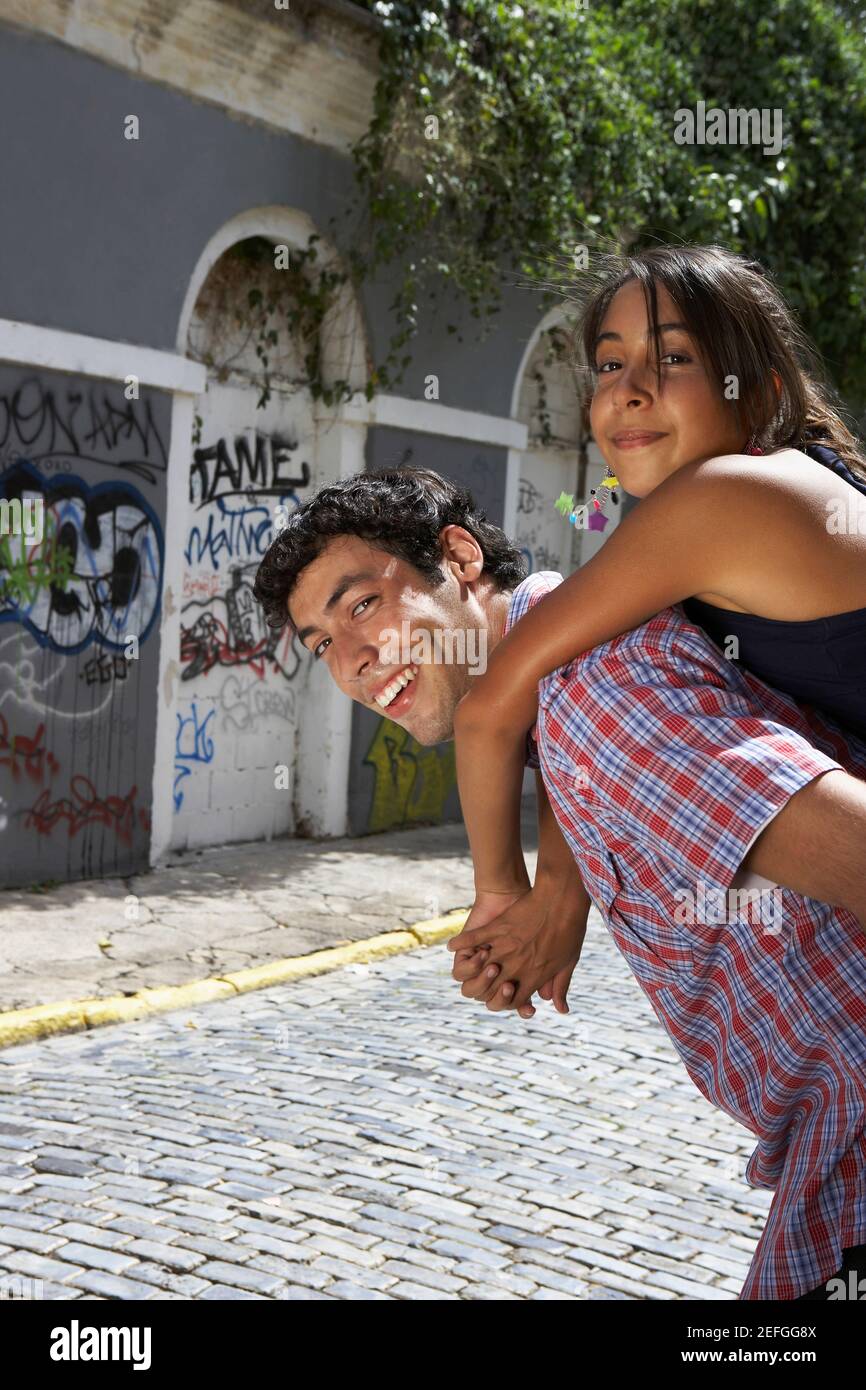 Piggyback Adults Side View High Resolution Stock Photography and Images ...