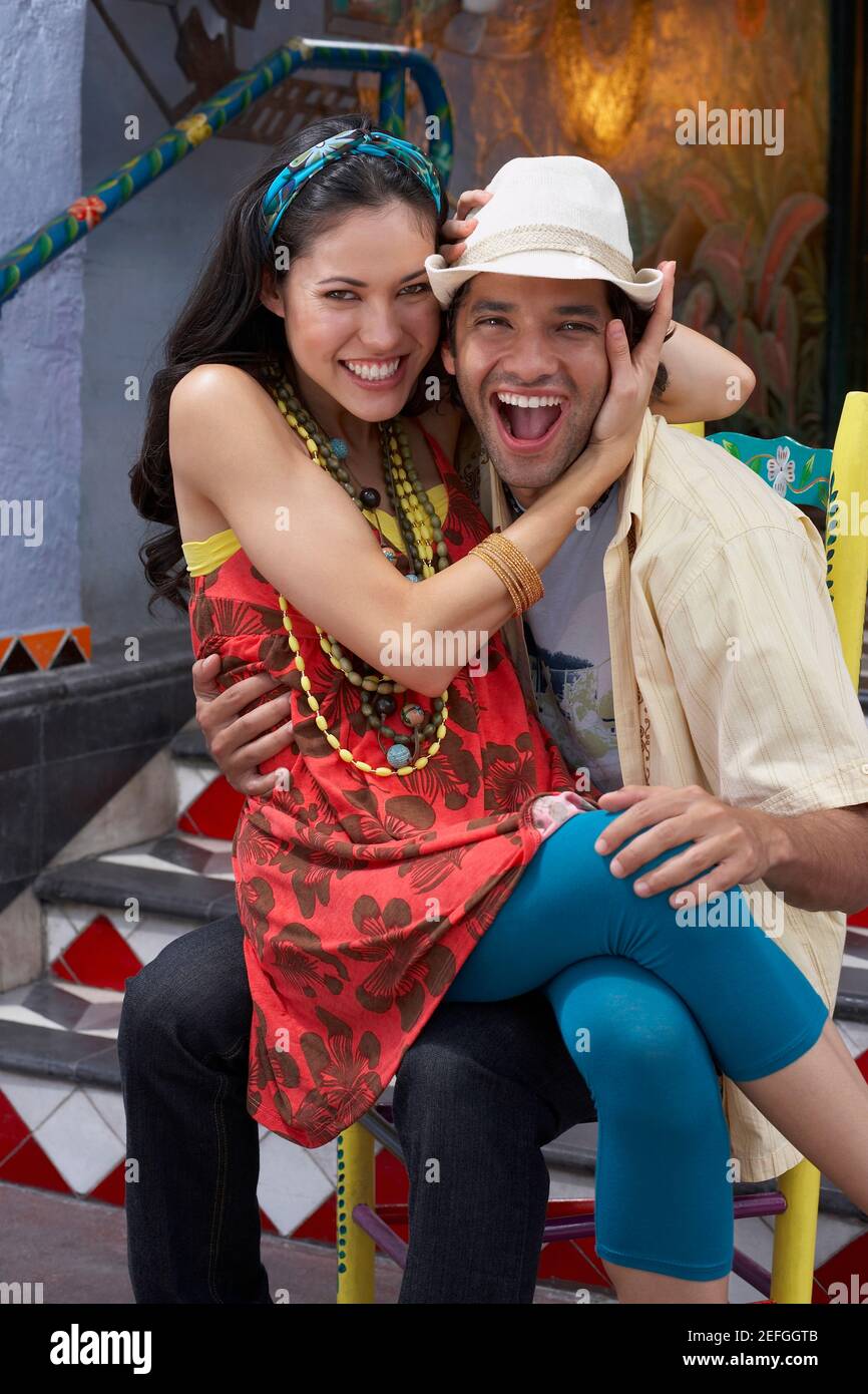 Man sitting on the lap of a woman hi-res stock photography and images ...