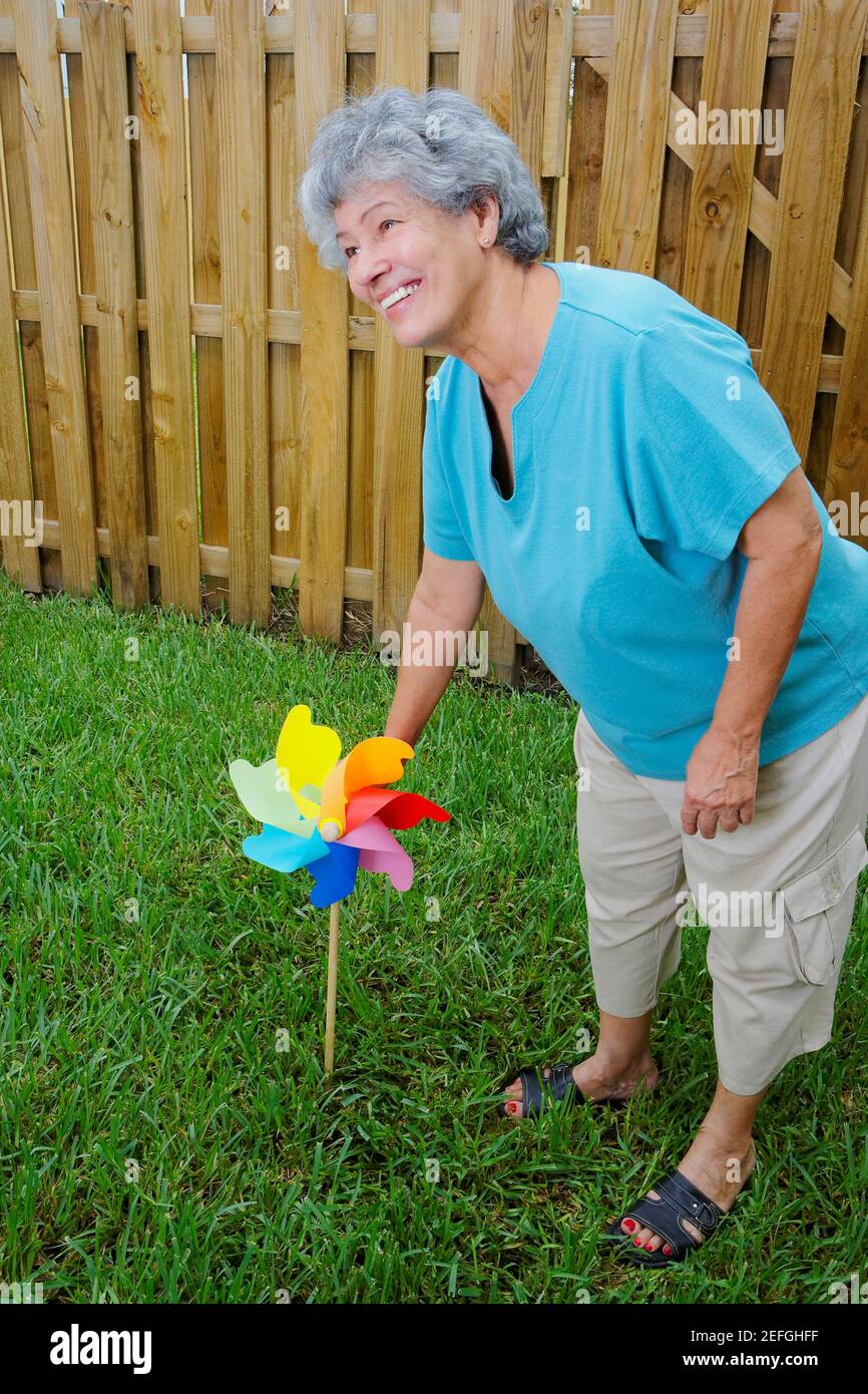Woman fixing fence hi-res stock photography and images - Alamy